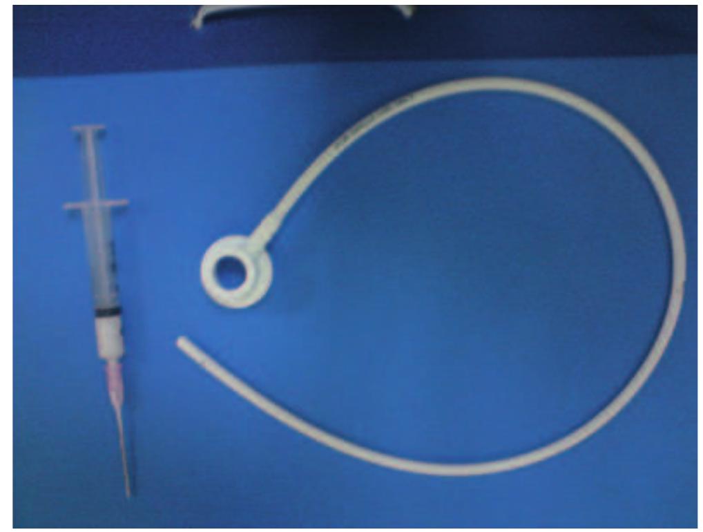 Transnasal catheter and syringe filled with omnipaque. for
