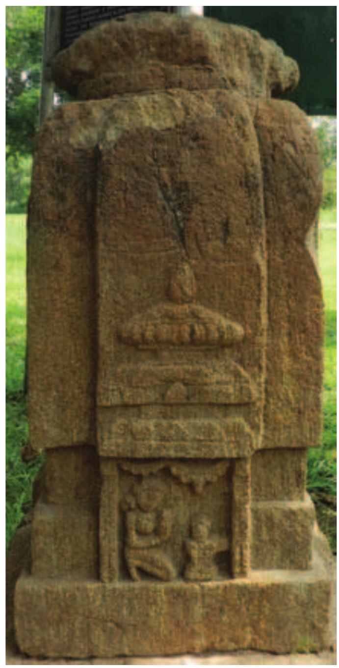 Miniature sikhara shwing kneeling female vaisnava devotee