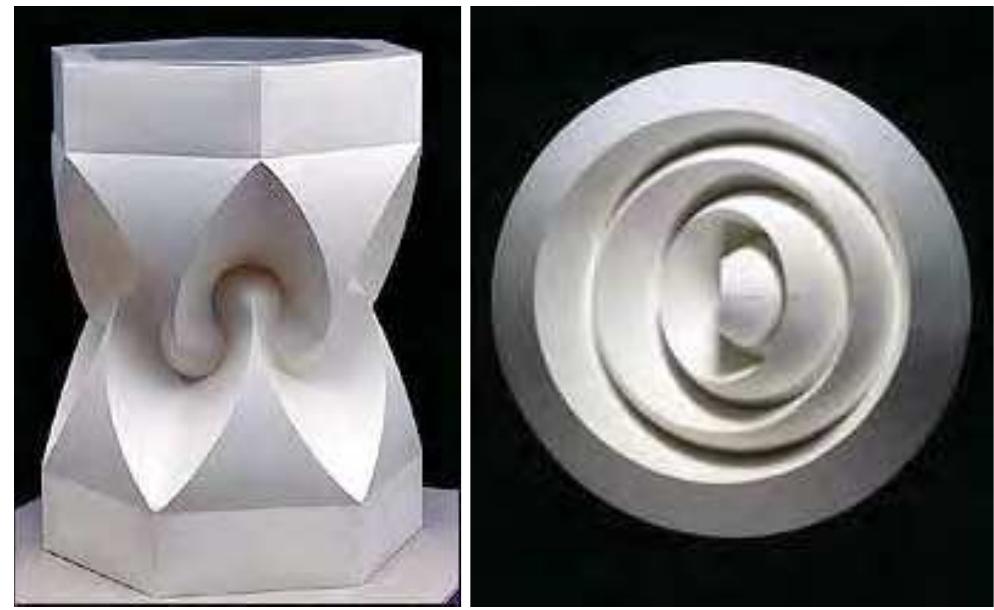 Two examples of paper models featuring curved folds that