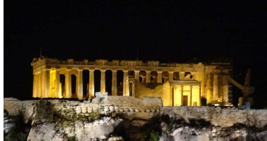 Parthenon of acropolis, side view at night, courtesy by