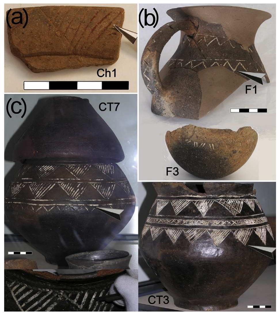 Ceramic shards and implements bearing incisions or