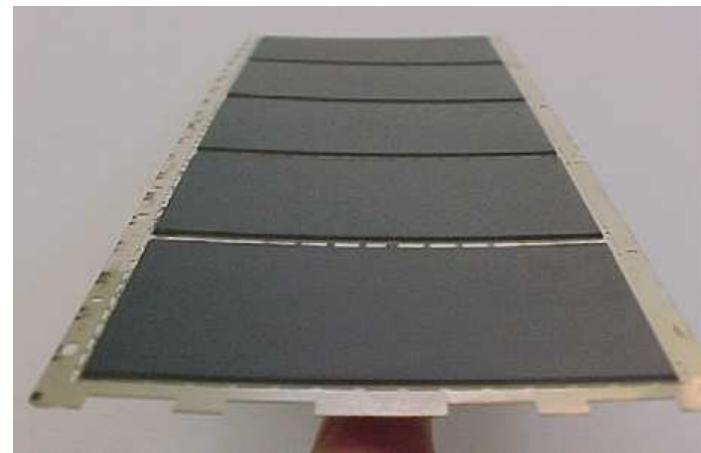 Warpage of a map mould, induced during the molding process.