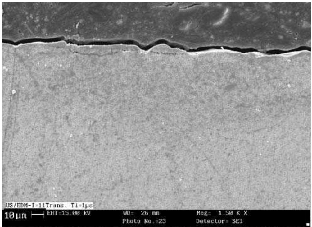 Sem micrograph showing cross-section of us/edmed piece (i=40