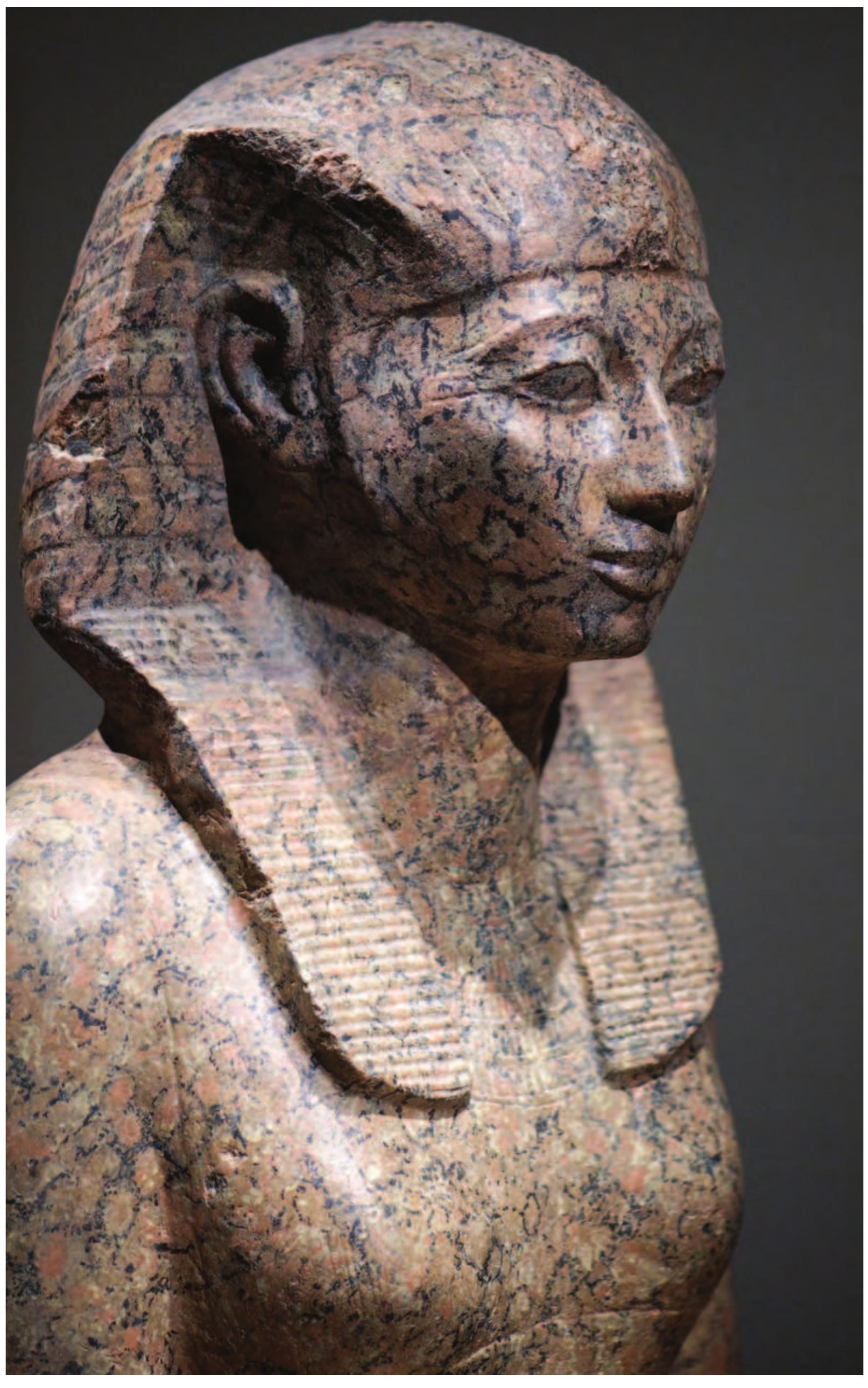 Female king hatshepsut depicted with a female body and nemes