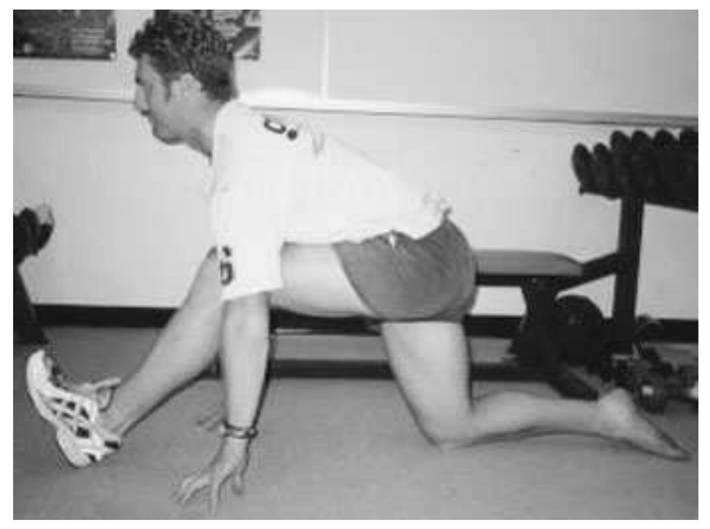Ba. | bent-leg hamstring stretch in a kneeling position.