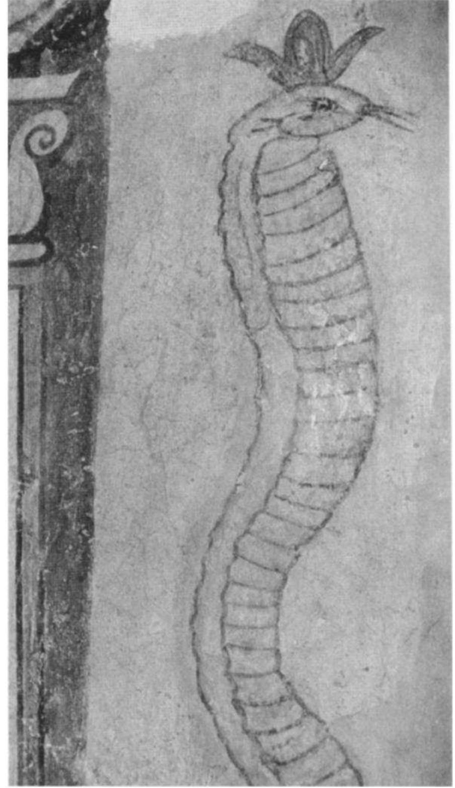 Agathodaimon from left wall flanking door. (photo author)