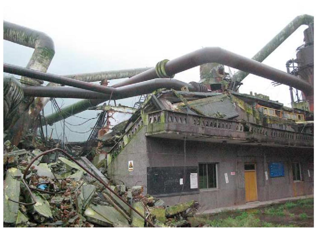 Top-storey collapse at a factory building.