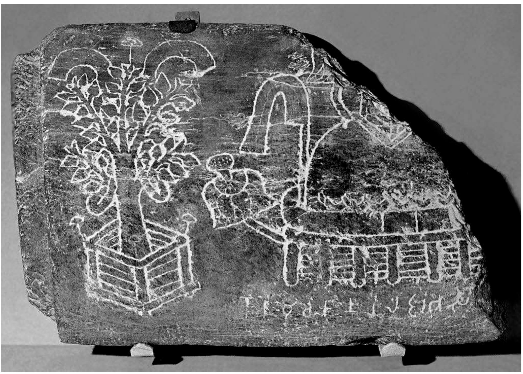 18. carving showing a sacred bodhi tree enclosed within a