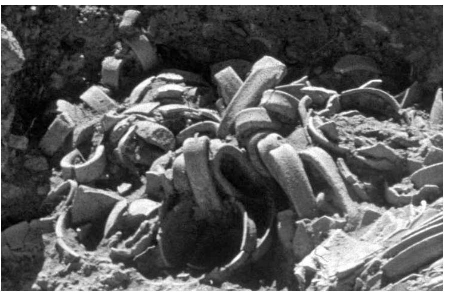 16. fallen stack of dippers from southeast side, room 22.