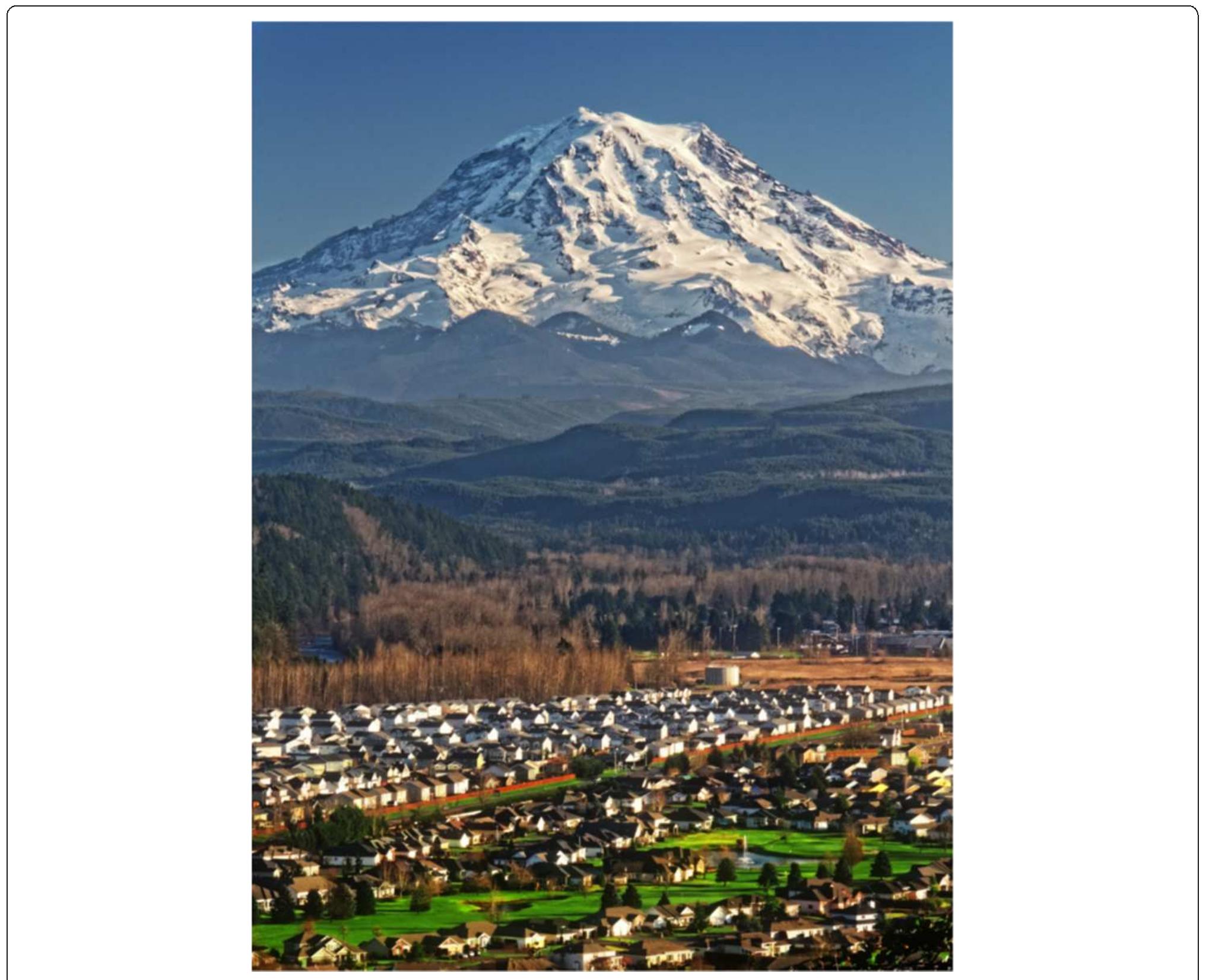 Mount rainier volcano and dense residential housing in