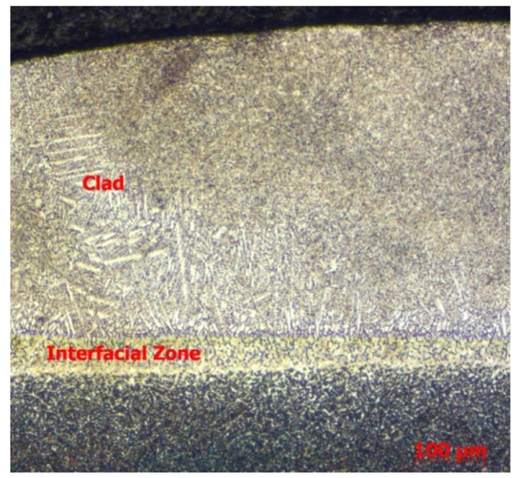 Optical micrograph showing different zones of cpm 9v (cz: