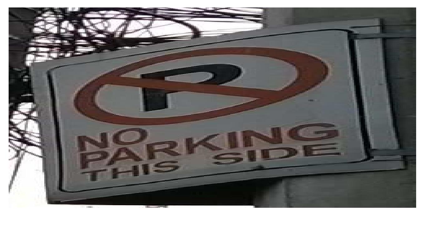 No parking this side the double face sign could be seen in