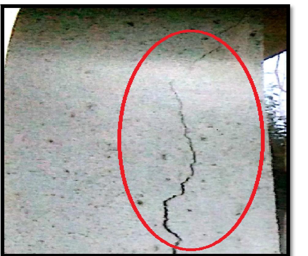 Showing corner column shows corrosion cracks