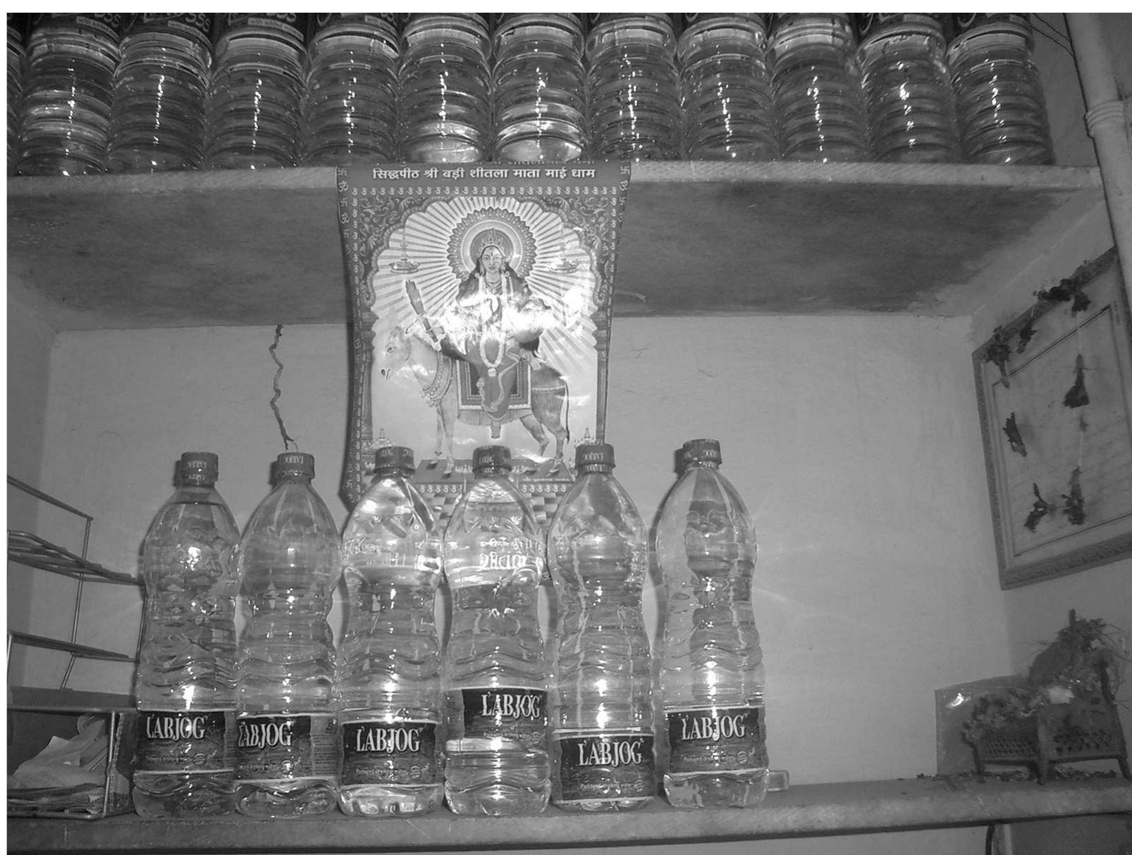 Sitala protecting bottled water from pollution, tea stall,