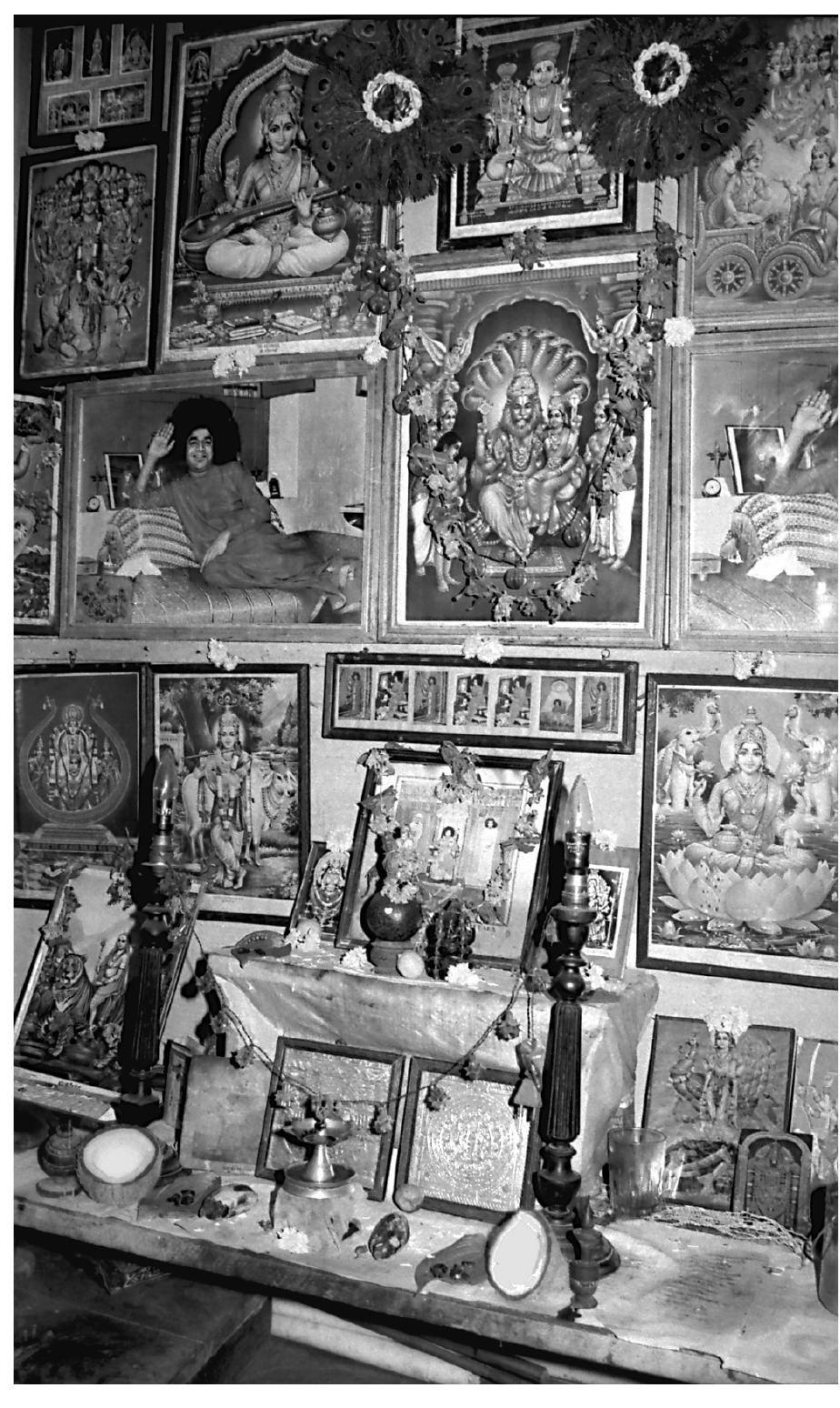 Altar in gods’ room of toda house with icons of hin- du gods