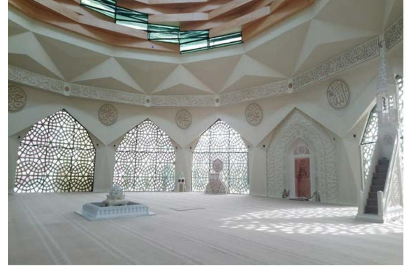 Fiberglass reinforced concrete-coated dome over steel