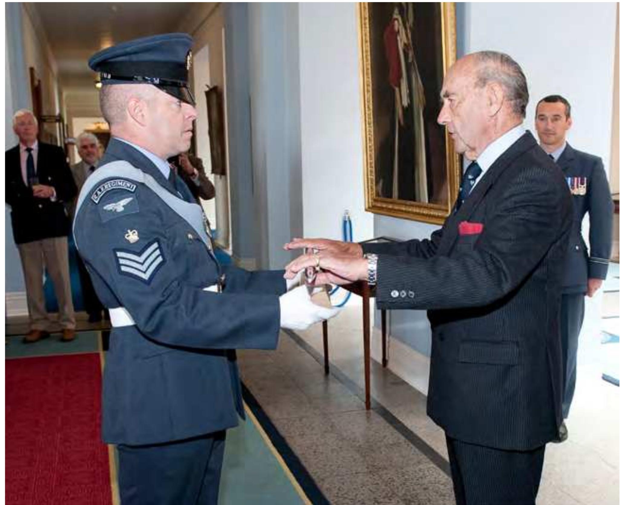 Flight sergeant richard bromell receives the jack holt