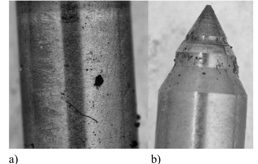 A. element of injector precision vapour, b) injector nozzle