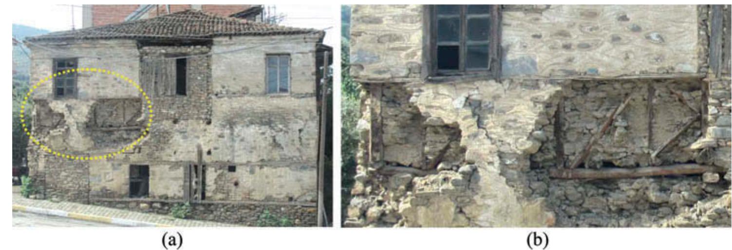 (a) a damaged house built of double-leaf masonry; (b)