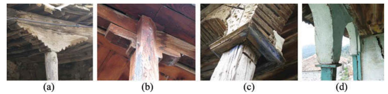 Timber elements supporting roof-eaves of the sofas