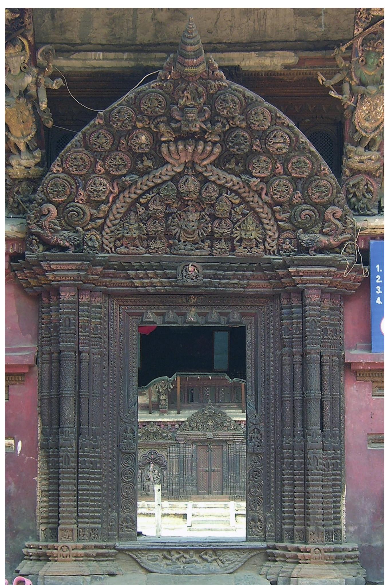 A the tympanum and lintel of a door leading to the taleju