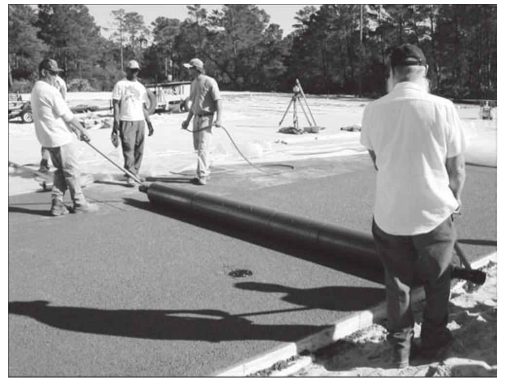 Example of compaction of pervious concrete by rolling