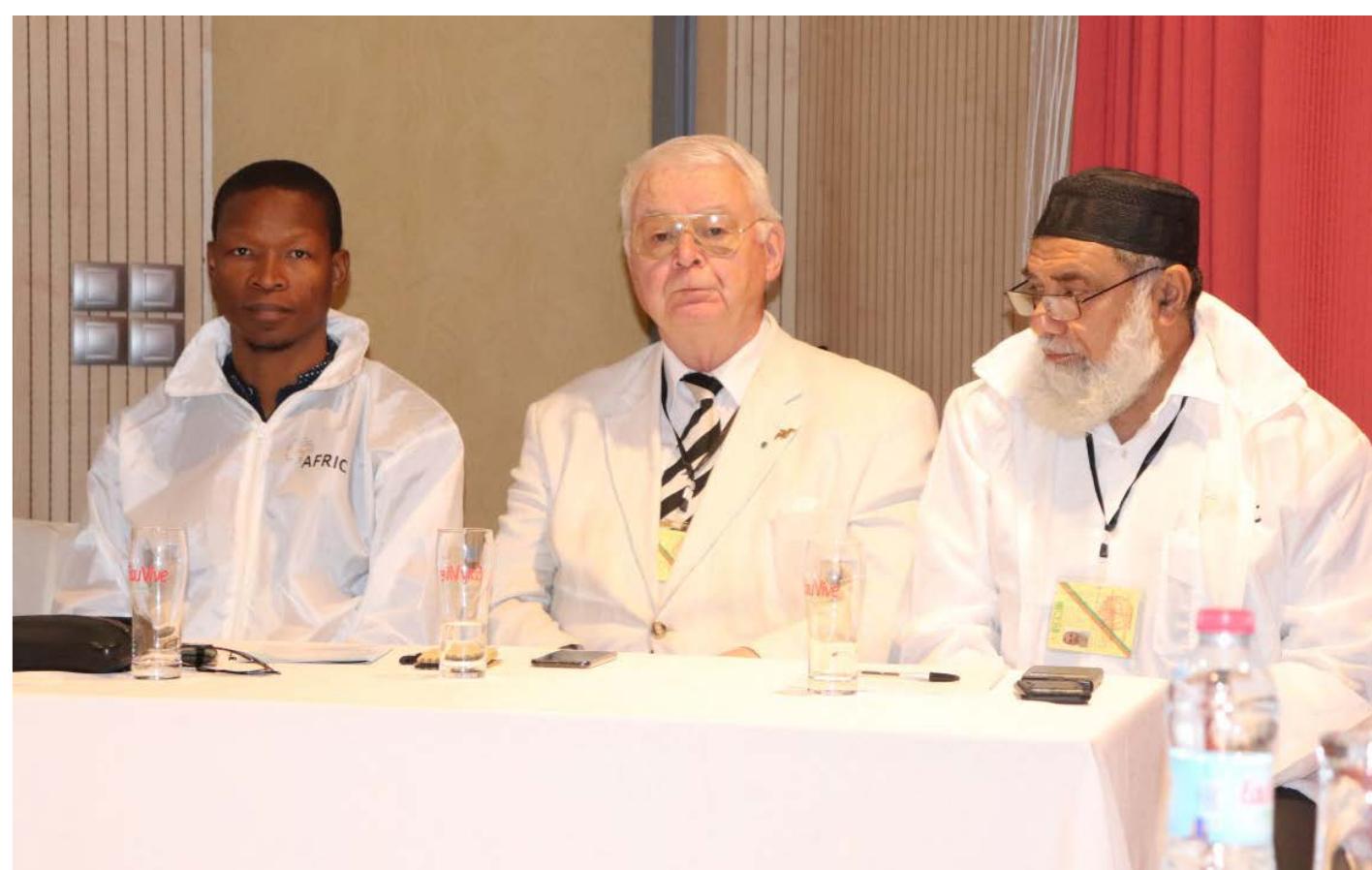 Afric's josé matemulane (left) and volker tschapke (centre)