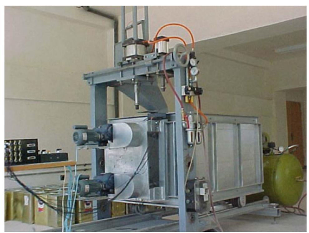 Soil tank, loading system and the raining device