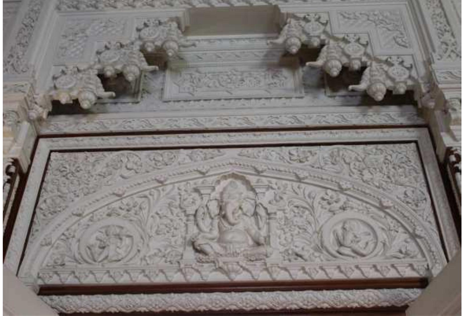 Detail of the plaster work depicting the hindu god ganesha