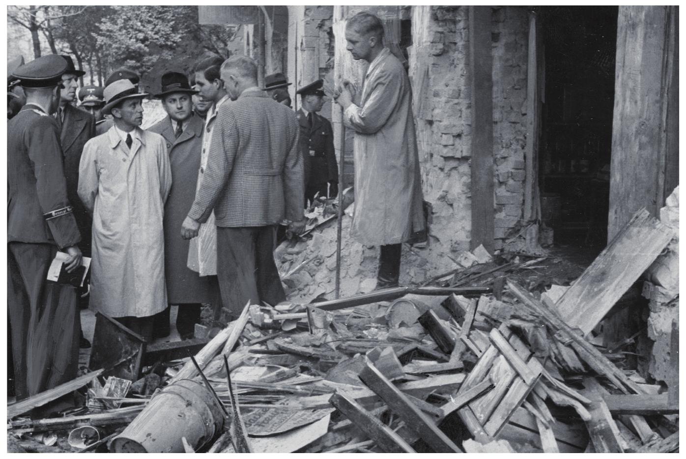 Joseph goebbels inspects destroyed residential area, cologne