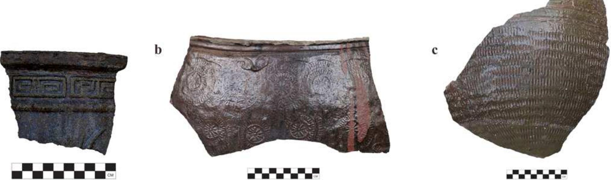 6 chinese brown-glazed stoneware vessels with elaborate