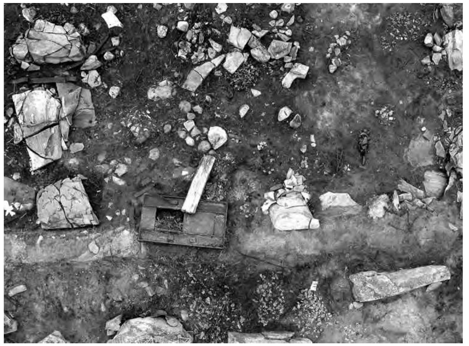 One trench was excavated in the dump just outside the