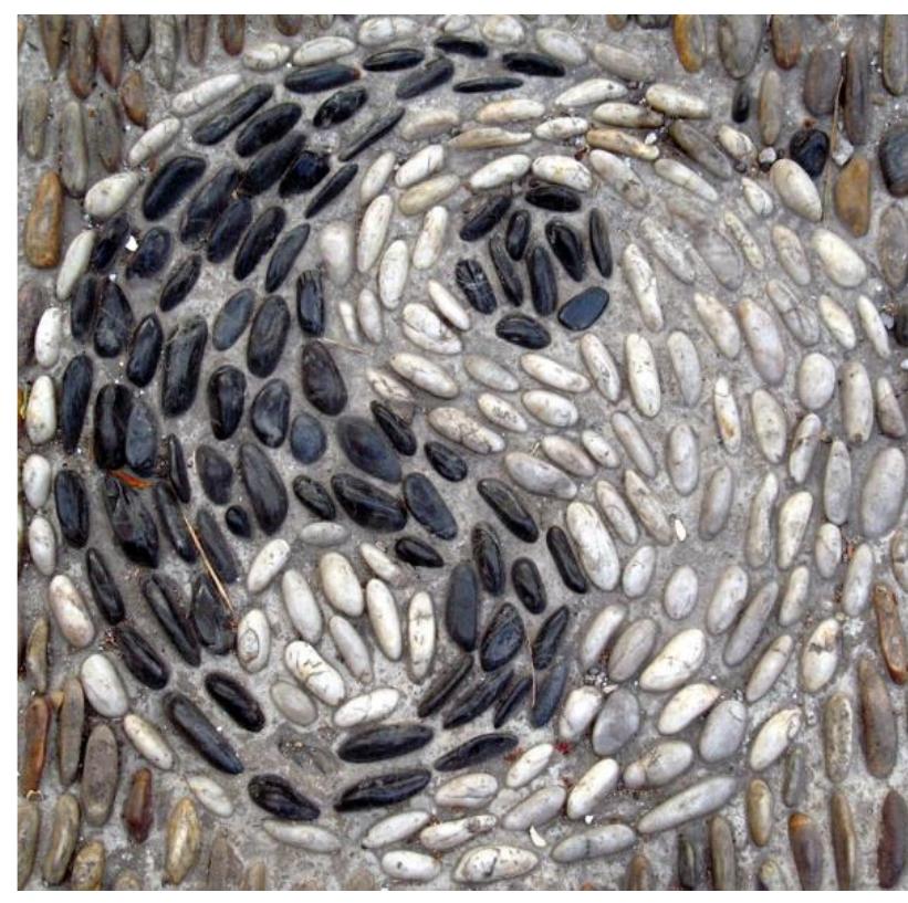 Suzhou street mosaics showing the yin yang symbol. all the