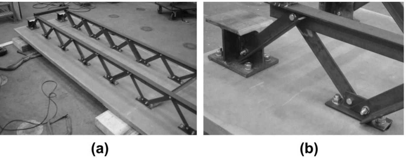 (a) steel truss assembly. (b) bolted connection to ecc slab.