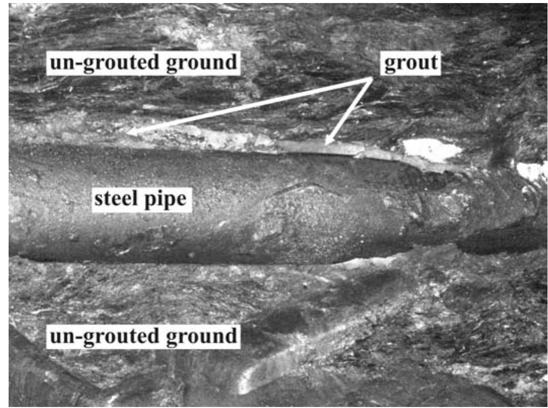 Detail of a pipe showing the grouted annular gap between