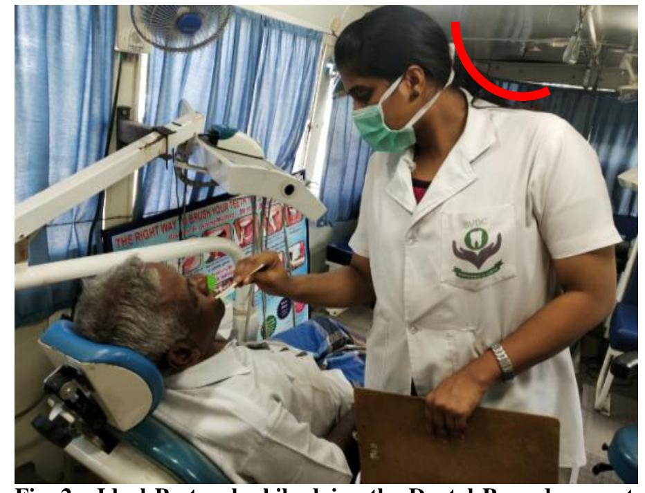 - arrow denotes the abnormal posture while doing dental