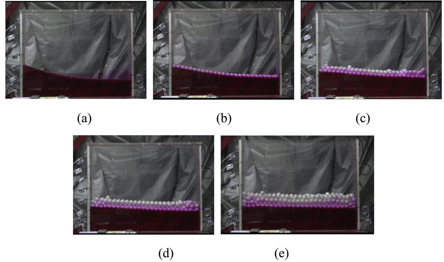 Snapshots of sloshing tanks with different layers of