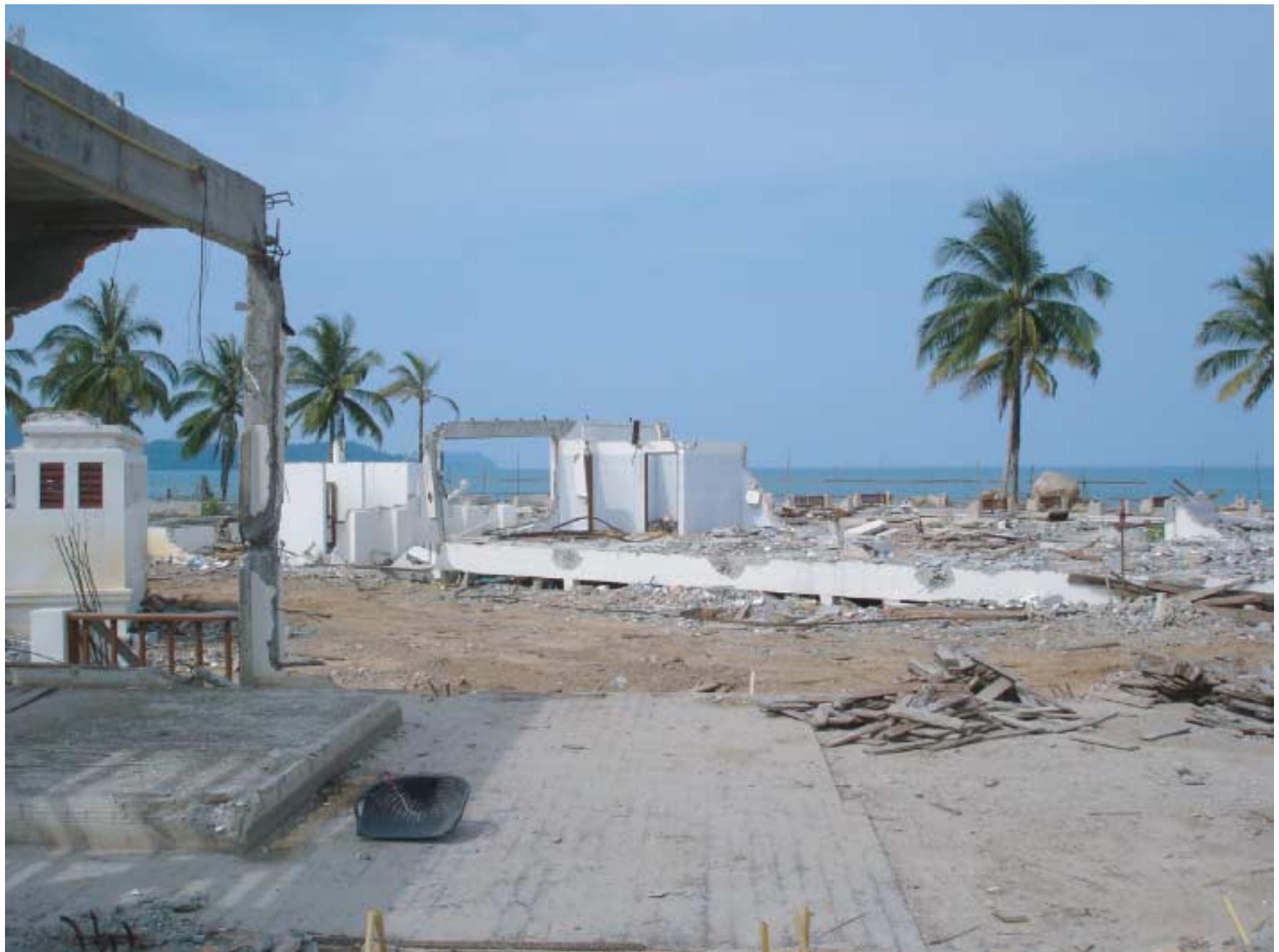 Plate 3 tsunami damage to resort immediately behind the