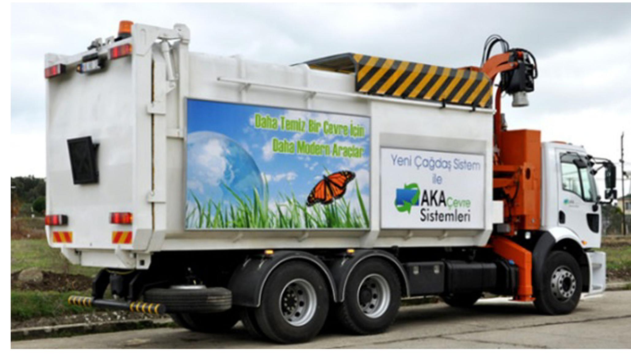 Solid waste collection vehicle with robotic arm