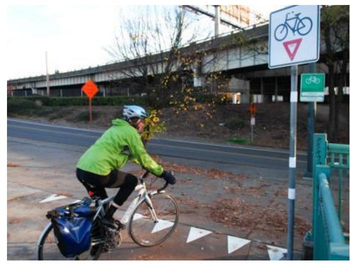 3 yield marking and signage connecting two bicycle