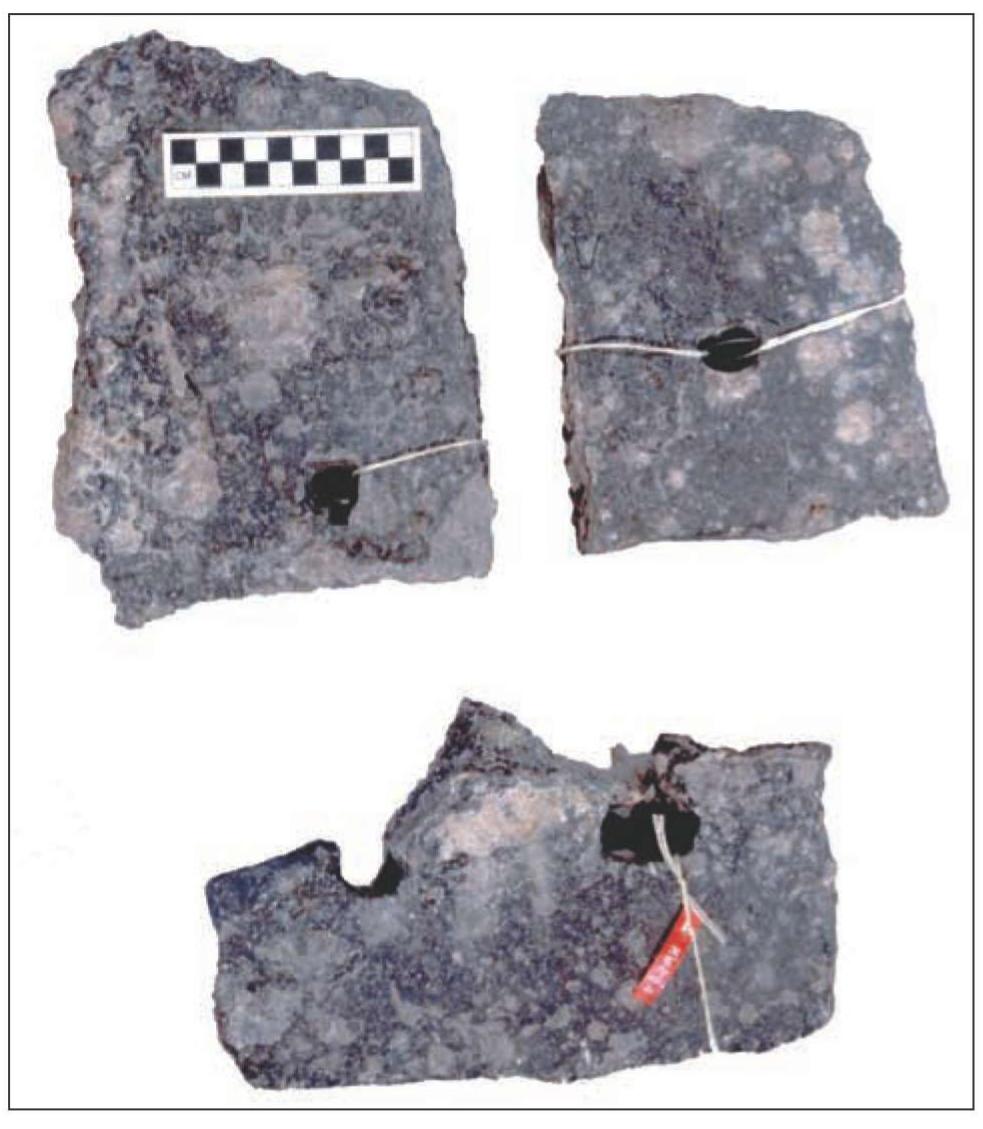 Three rectangular slab-ingot sections cut in antiquity kw