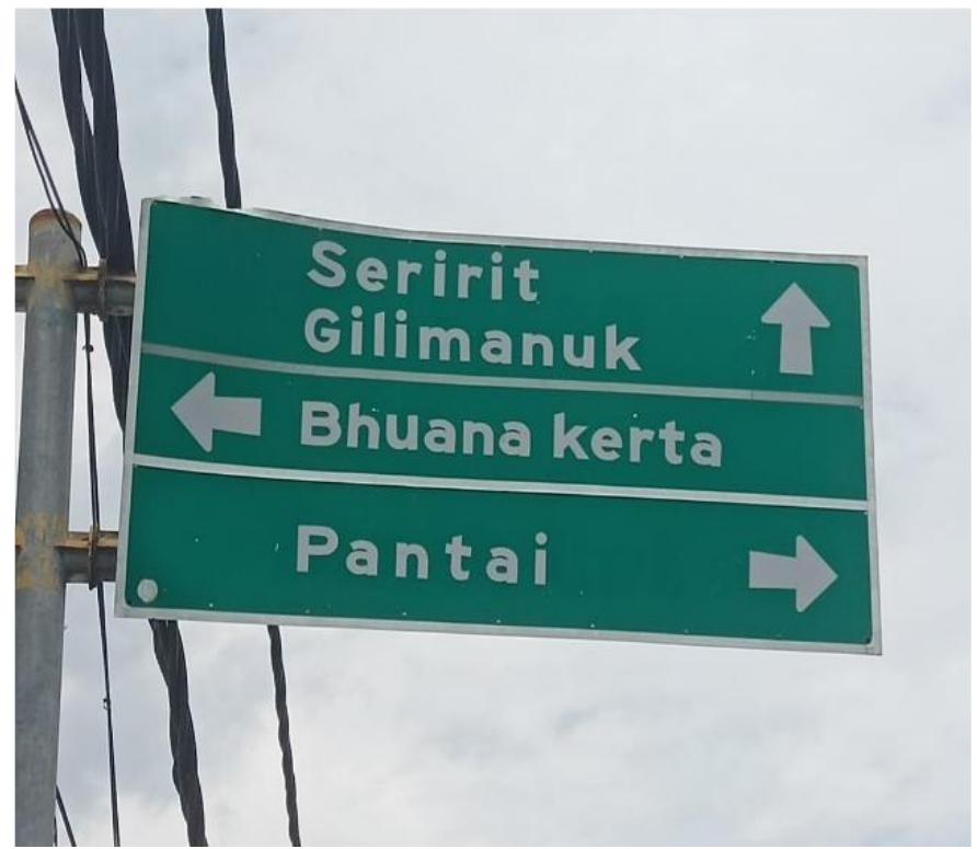The framing of the street name board is shown by the white