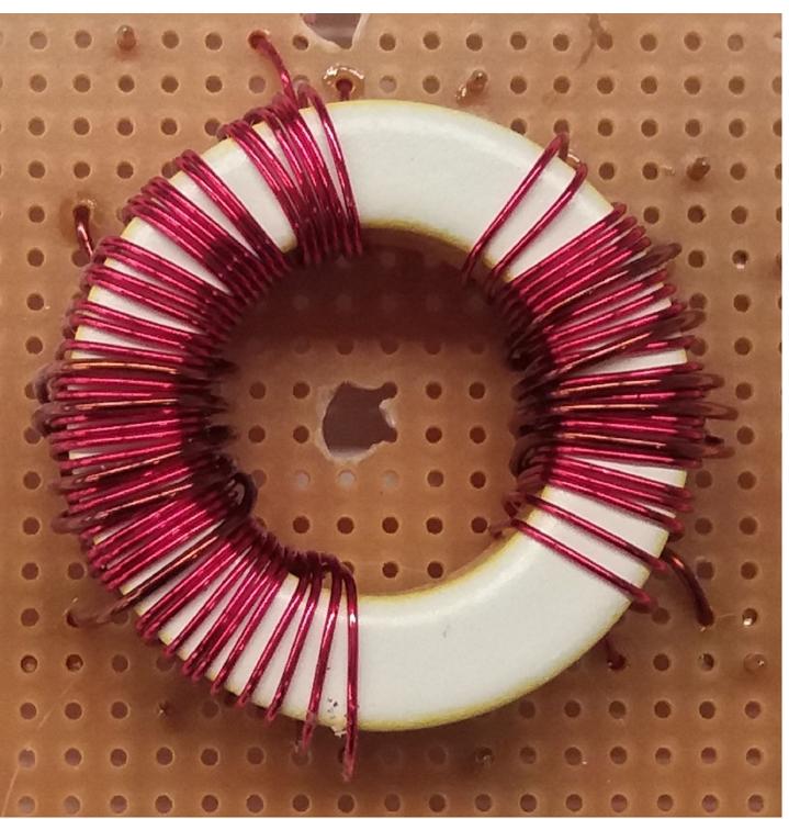 Five windings’ coupled inductor on an iron powder core. on