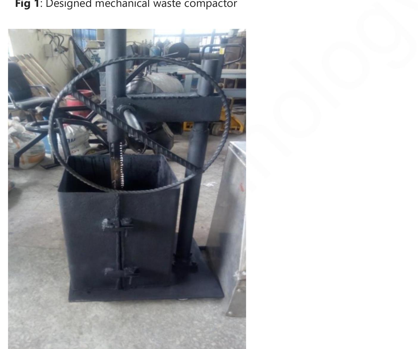 Fabricated mechanical waste compactor.