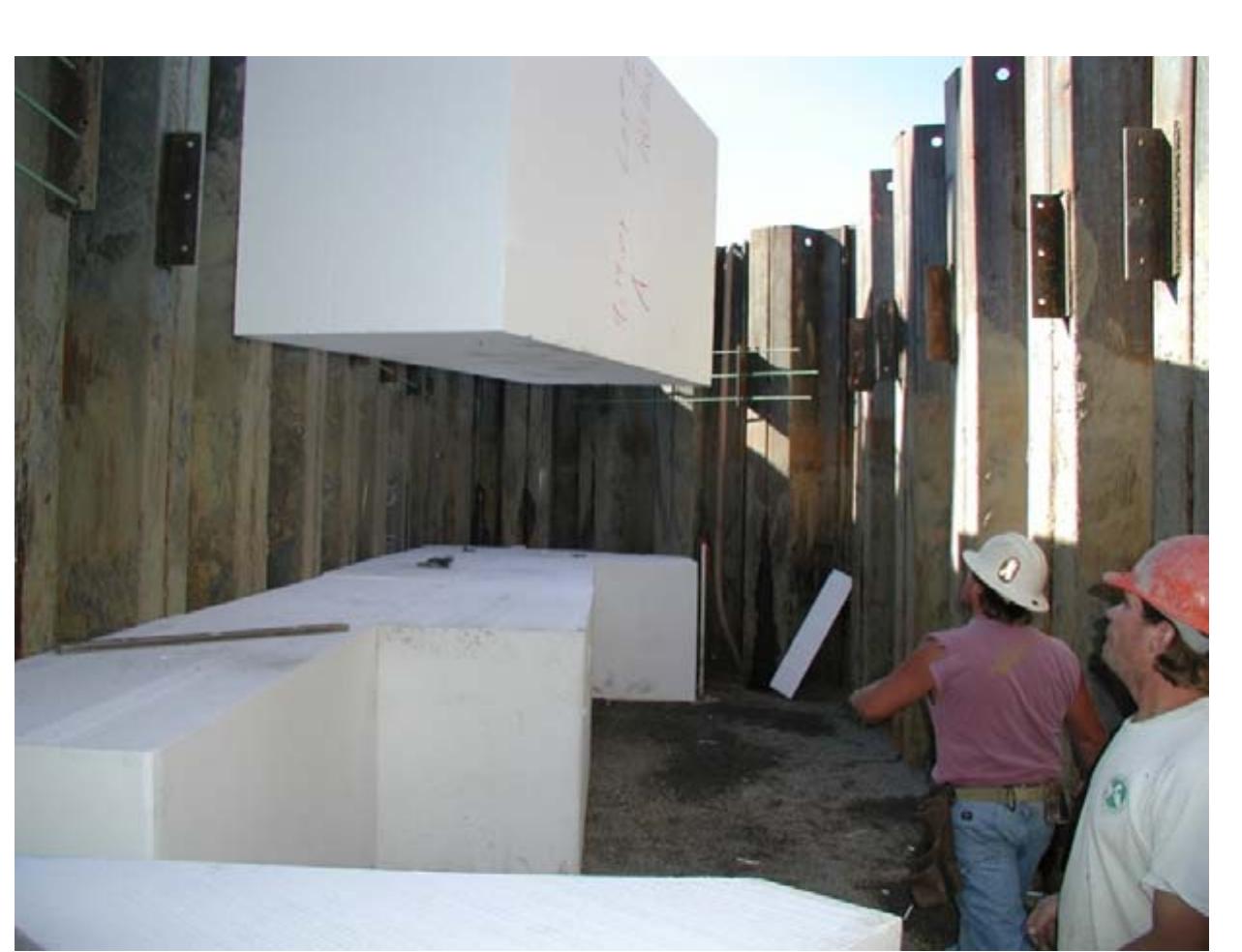 Geofoam placement within the sheet pile cell