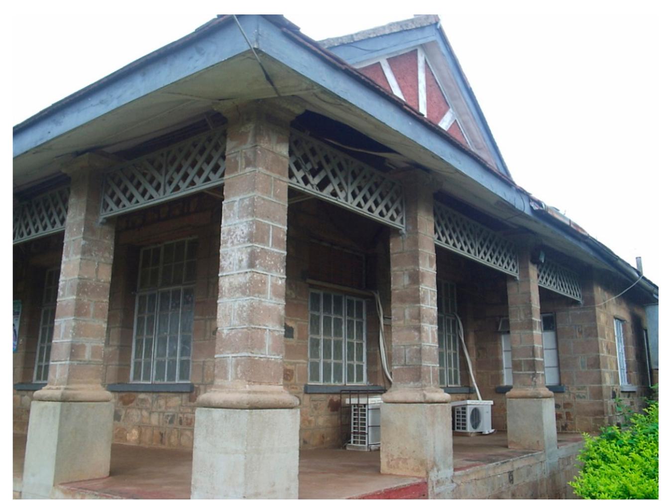 Saro-type bungalow, with framing veranda and timber fretwork