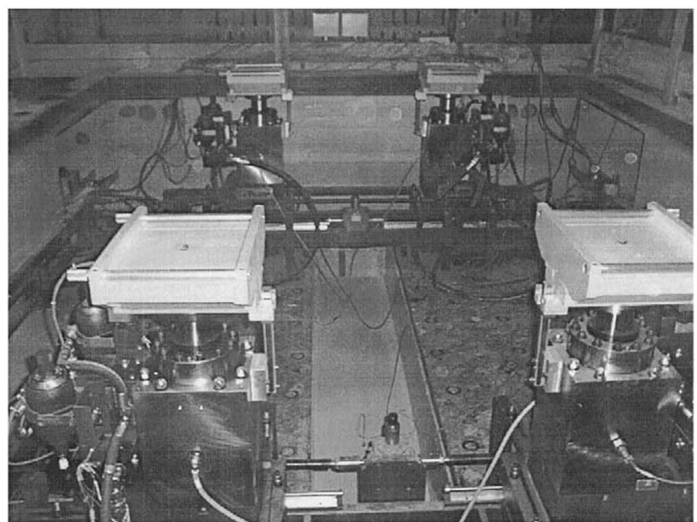 The actual test bench equipped with the four vertical actu- The actual test bench equipped with the four vertical actu-