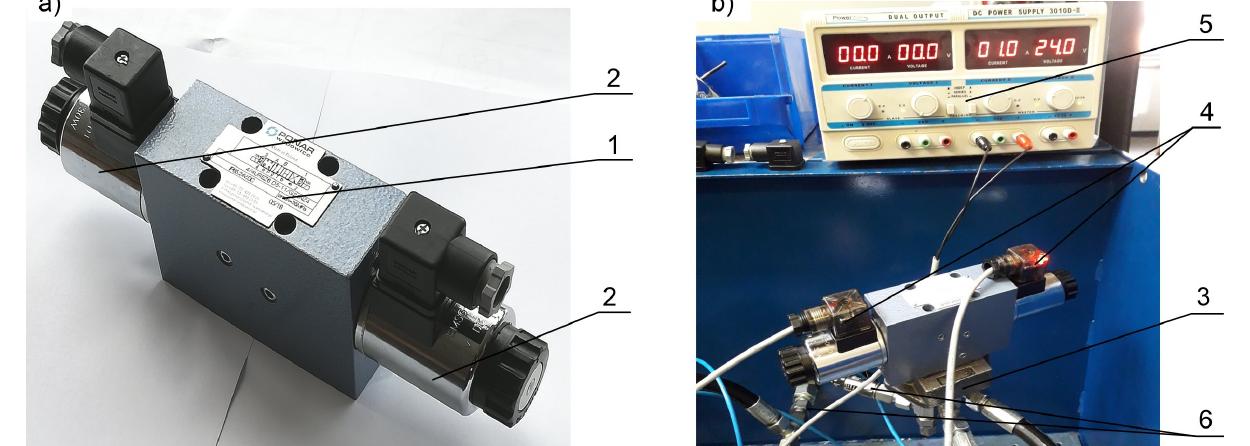 Laboratory equipment; (a) valve prototype, (b) test bench;