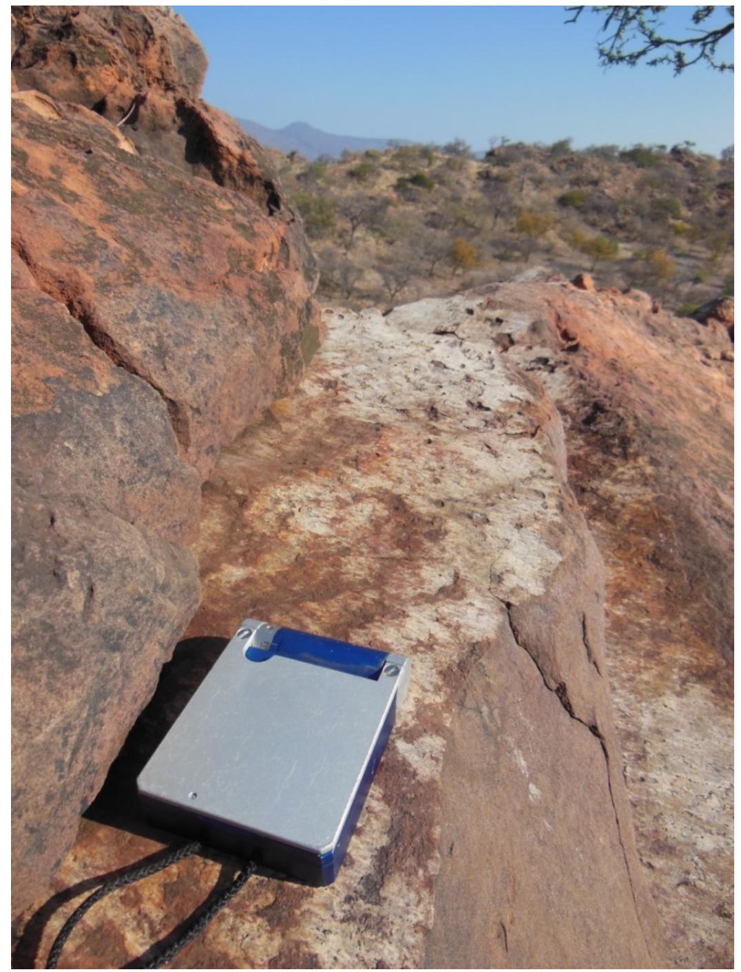 Low-angle slickensided thrust fault plane dipping towards
