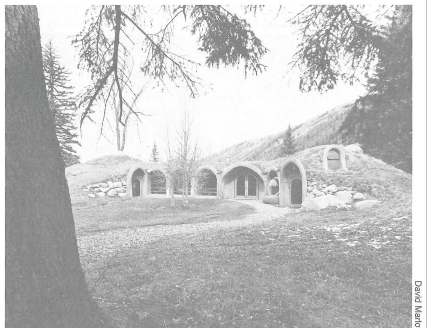 Earth berms, arched forms, and native landscape materials